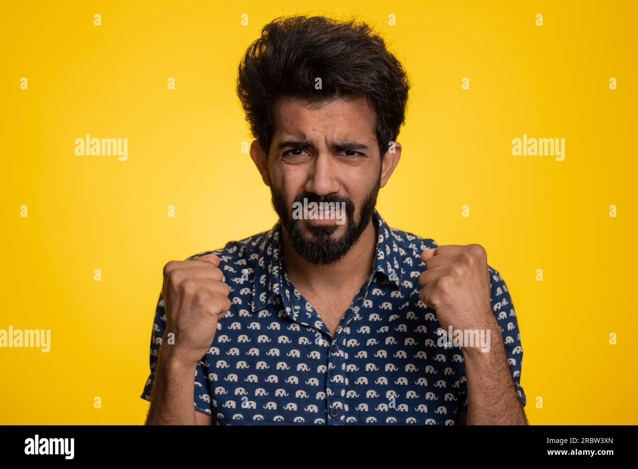 Indian man in shirt screams yell from stress tension problems feels ...