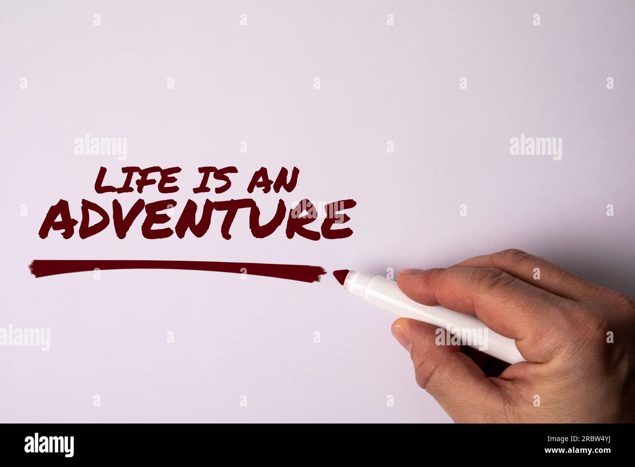 Life is an Adventure. Handwritten text on white background Stock Photo ...