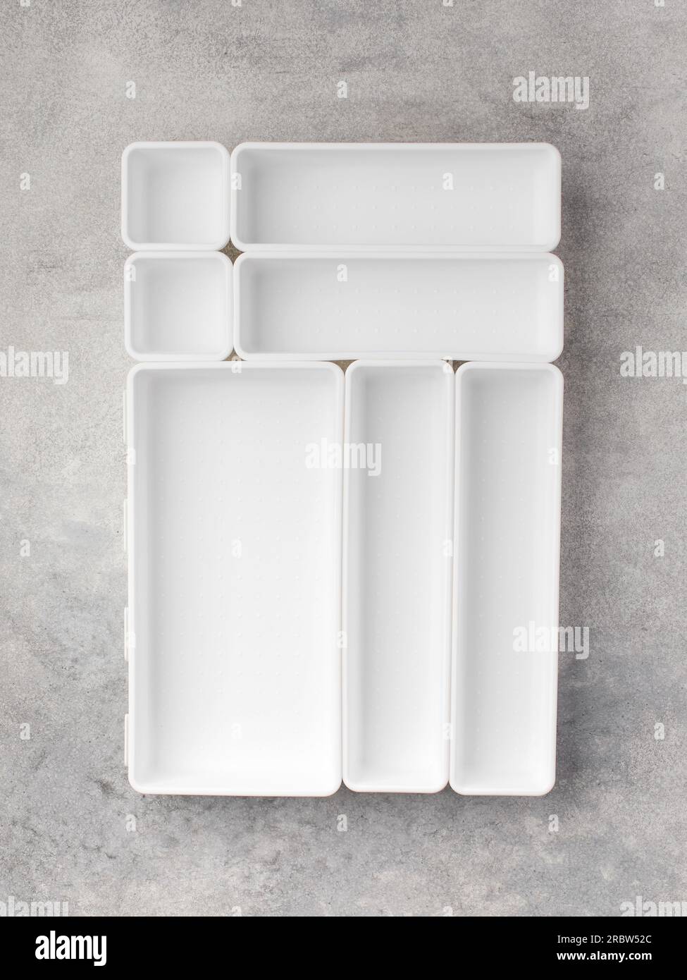 A set of plastic containers, boxes for convenient storage inside a ...