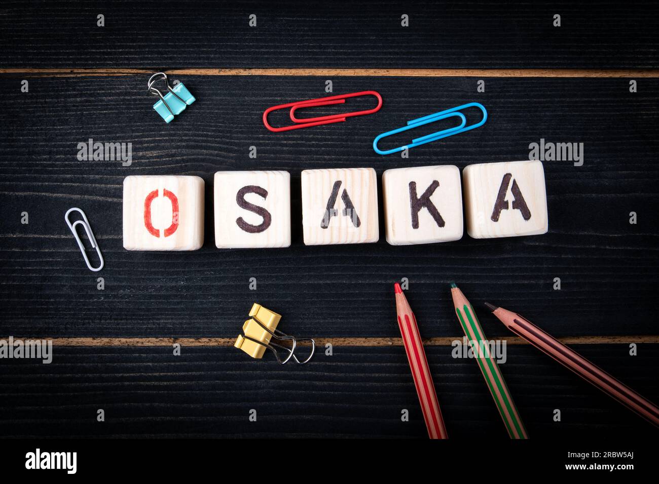 OSAKA. City name from alphabet letters on wood texture background Stock ...