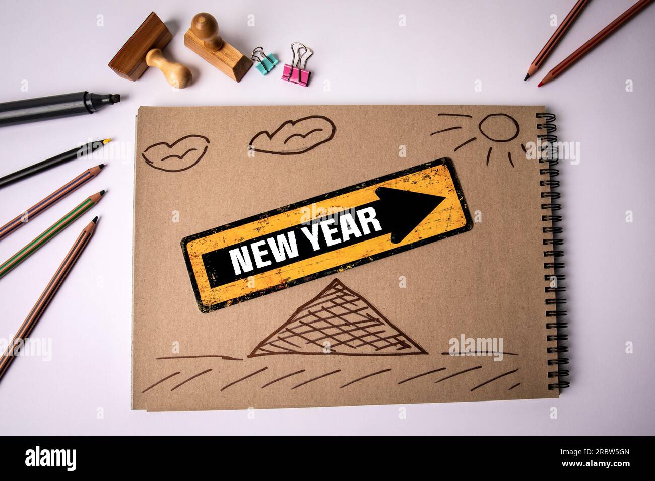 New Year Concept. Direction development arrow with text on office desk ...