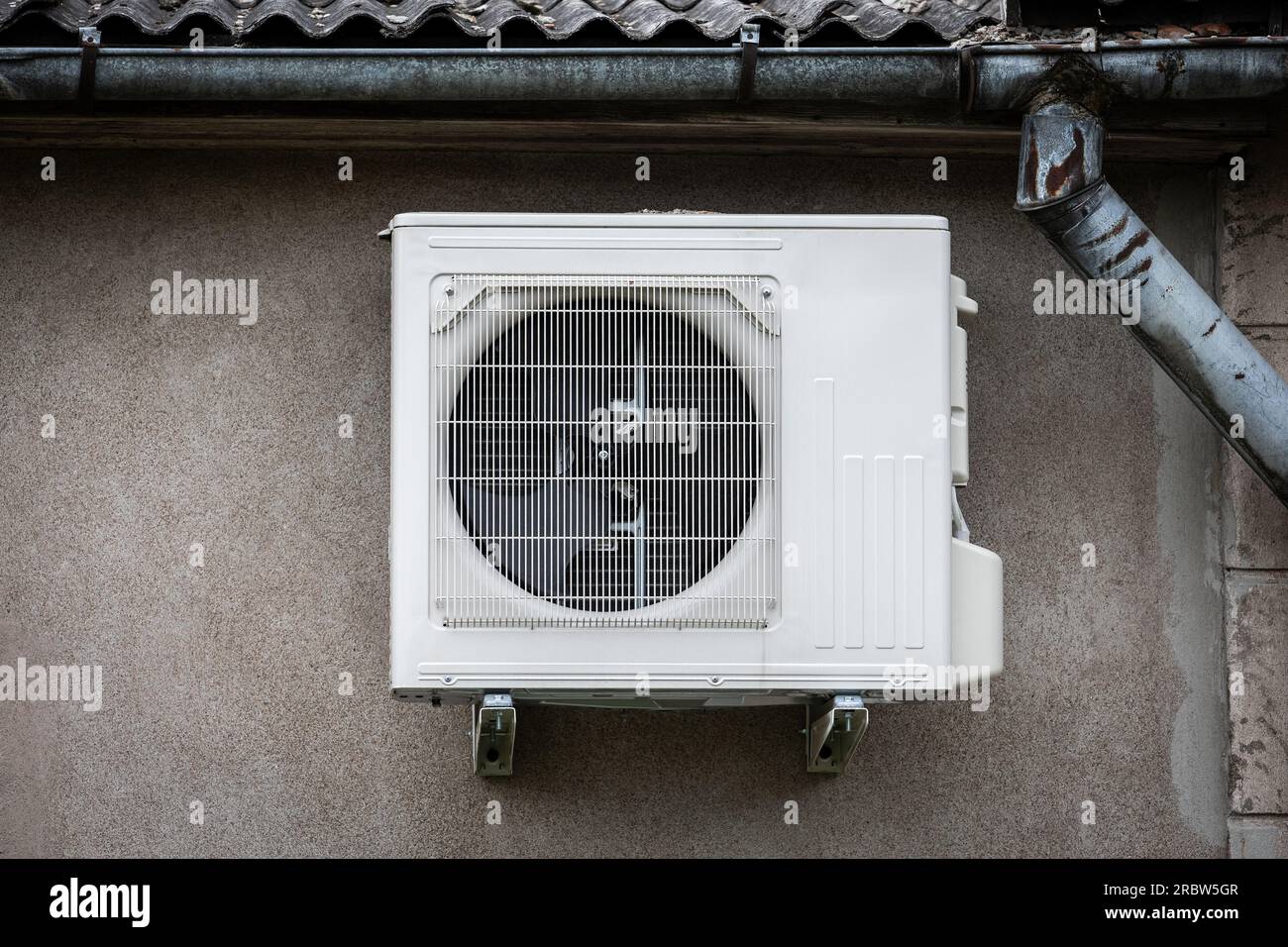 Outdoor air conditioning unit on the facade of the house Stock Photo ...