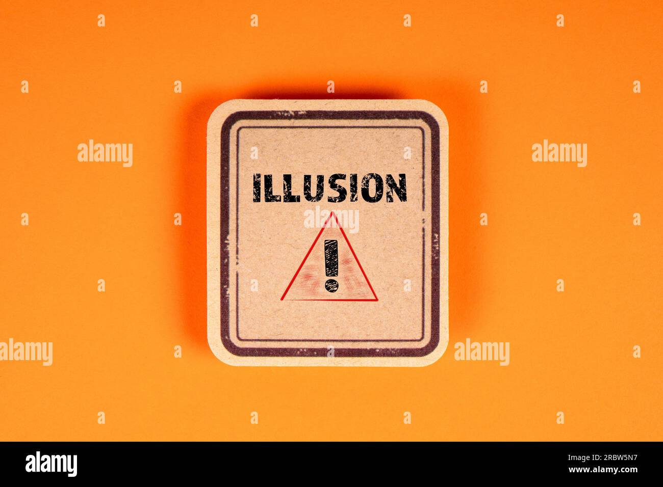 Illusion Concept. Sticky note with text on an orange background Stock ...