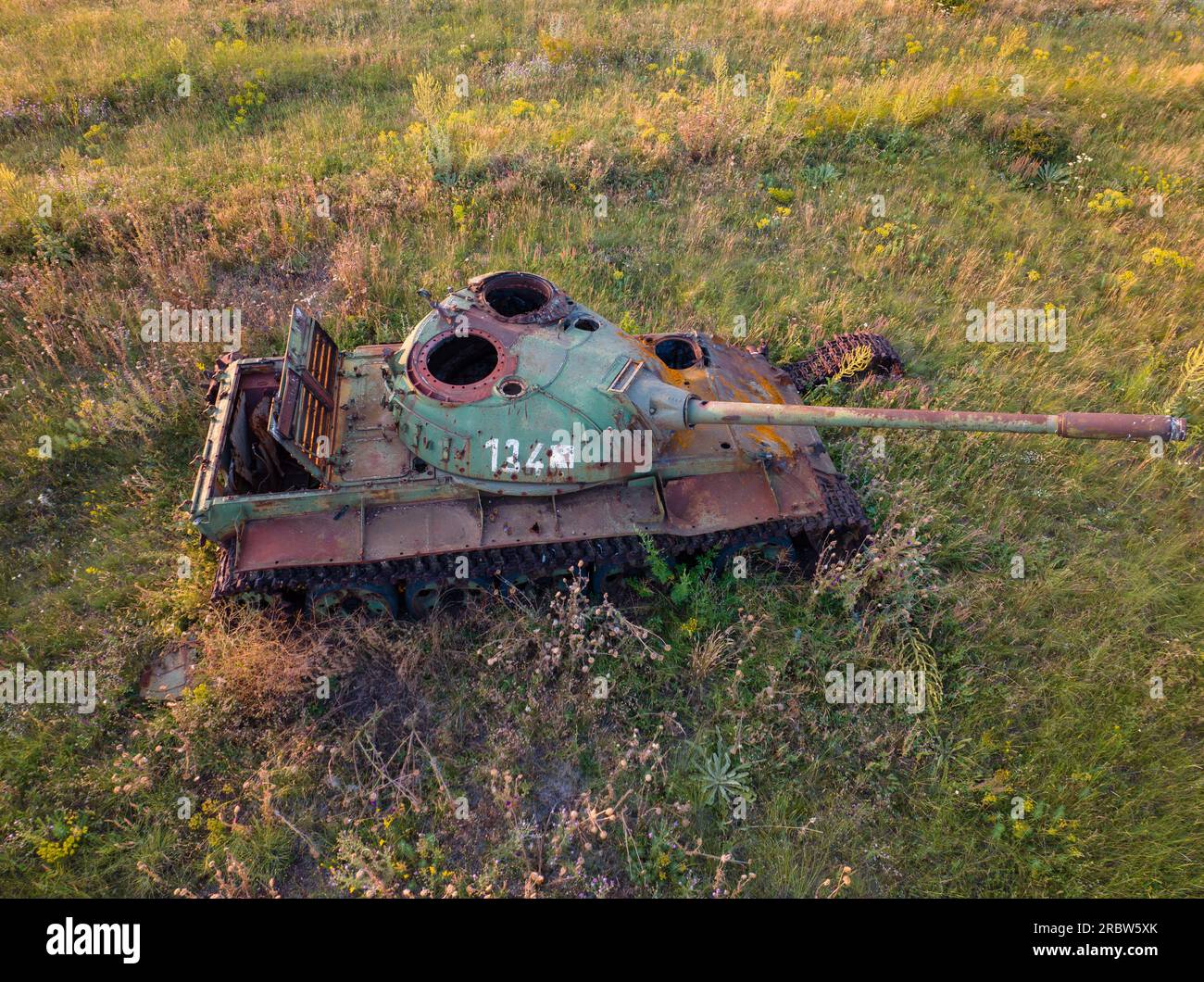 Aerial view about abandoned rusted battle tank in the middle of an ...