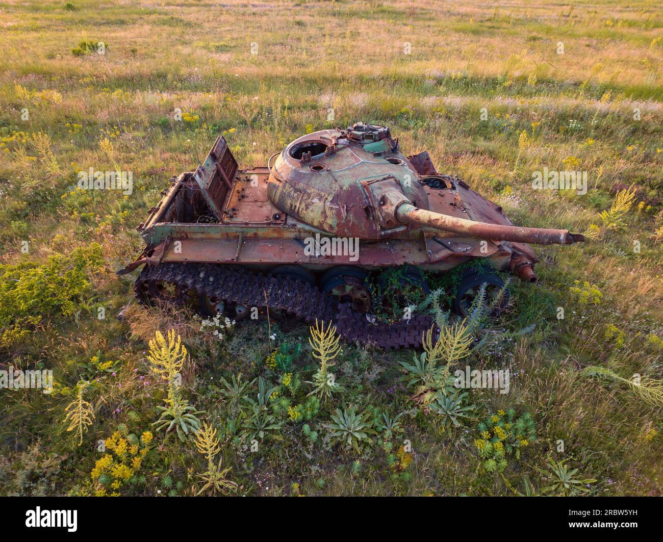 Aerial view about abandoned rusted battle tank in the middle of an ...