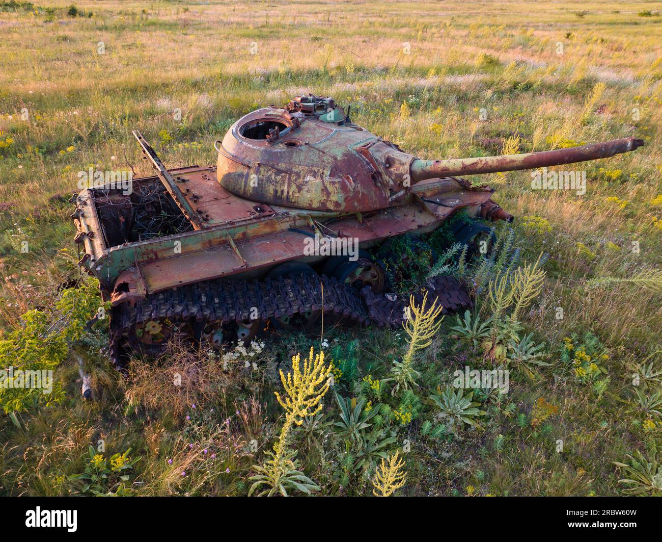 Aerial view about abandoned rusted battle tank in the middle of an ...