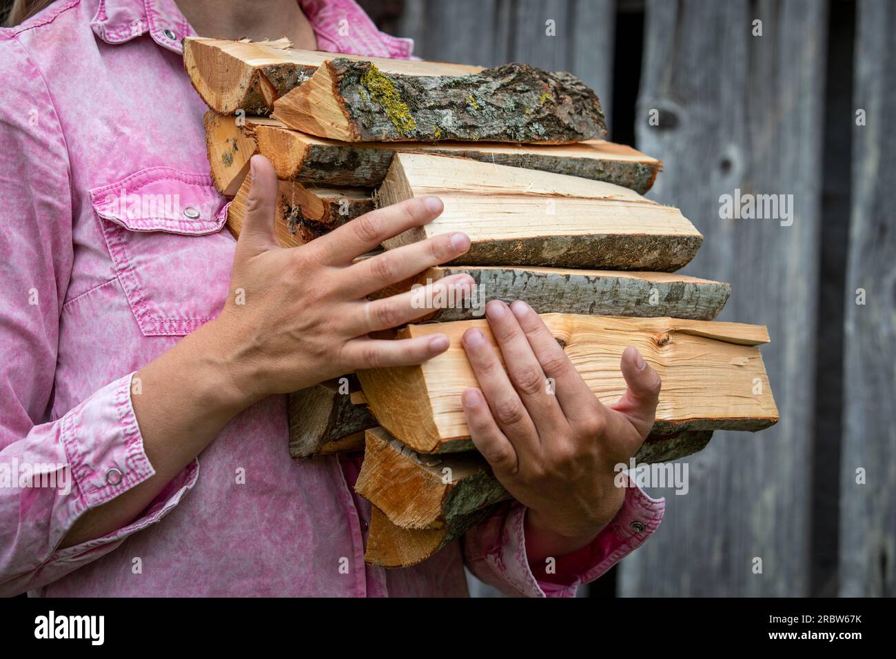 Woman firewood chop hi-res stock photography and images - Alamy