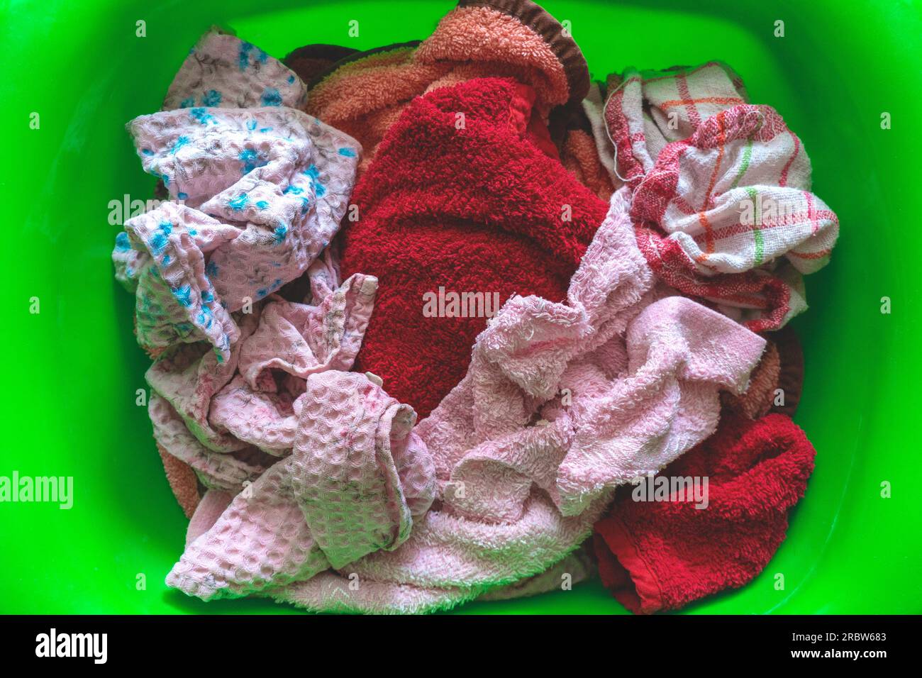 Background with kitchen towels. texture of multi-colored fabrics. A ...