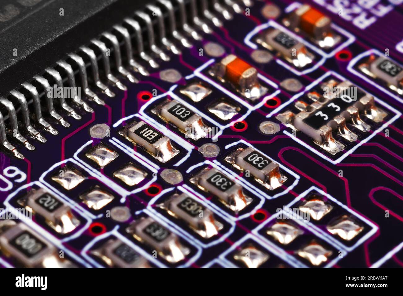 microchips integrated on motherboard, close up Stock Photo - Alamy