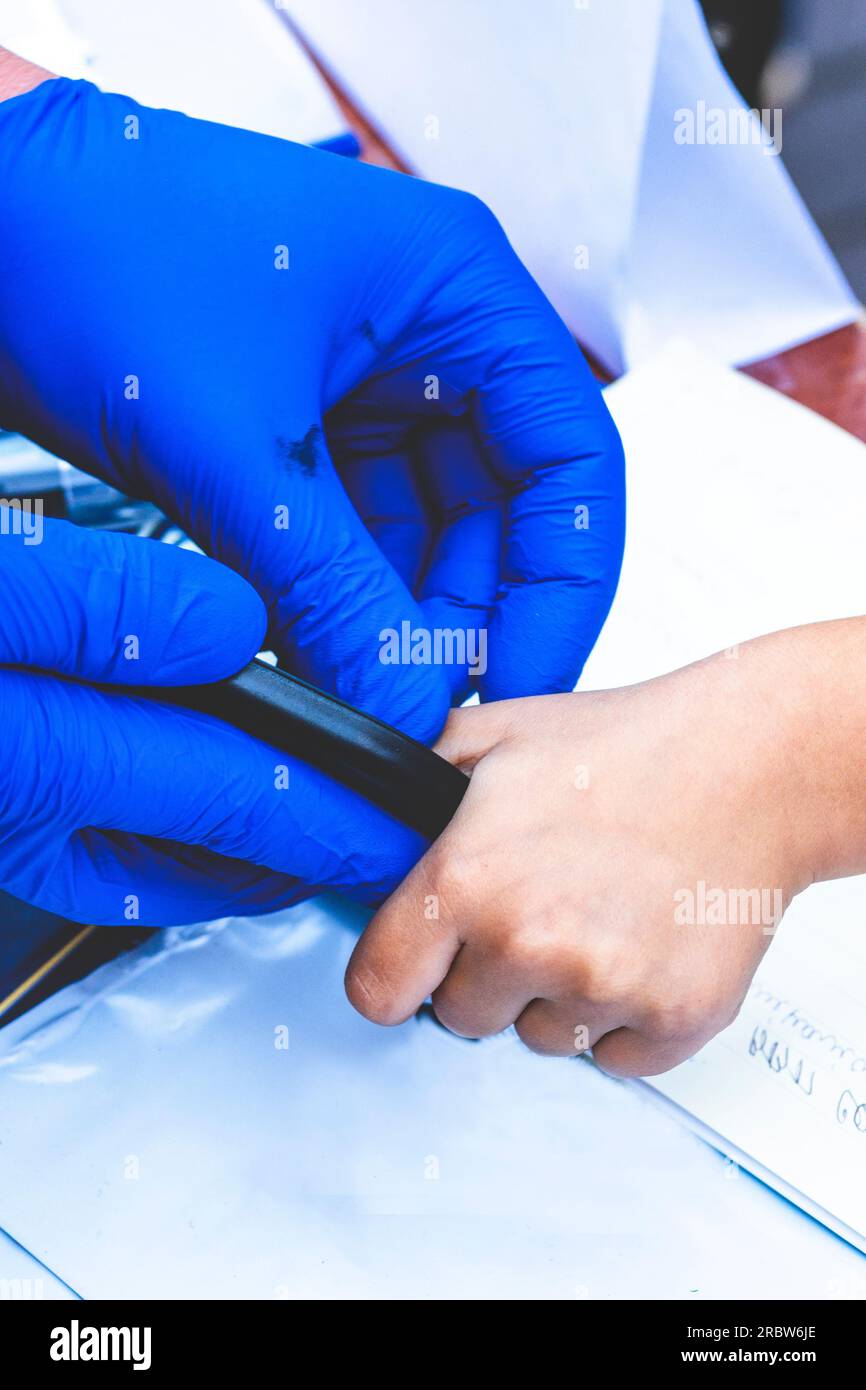 police expert takes fingerprints. Male fingerprint is taken. Concept ...