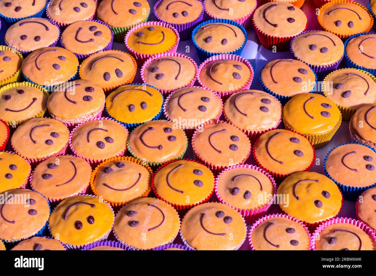 Smiley faces. smile cakes on table. The concept teamwork, friends ...