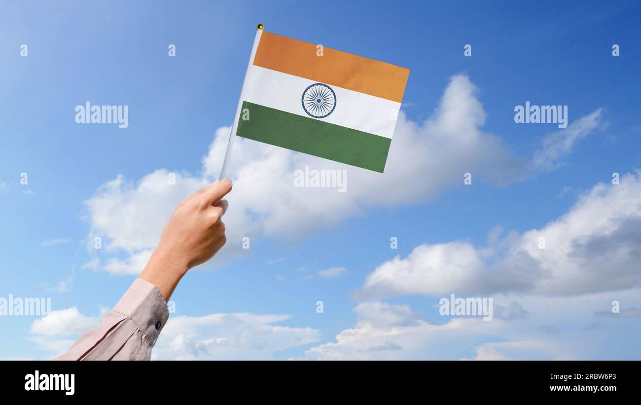 Human hand holding Indian flag. India Independence Day concept Stock ...