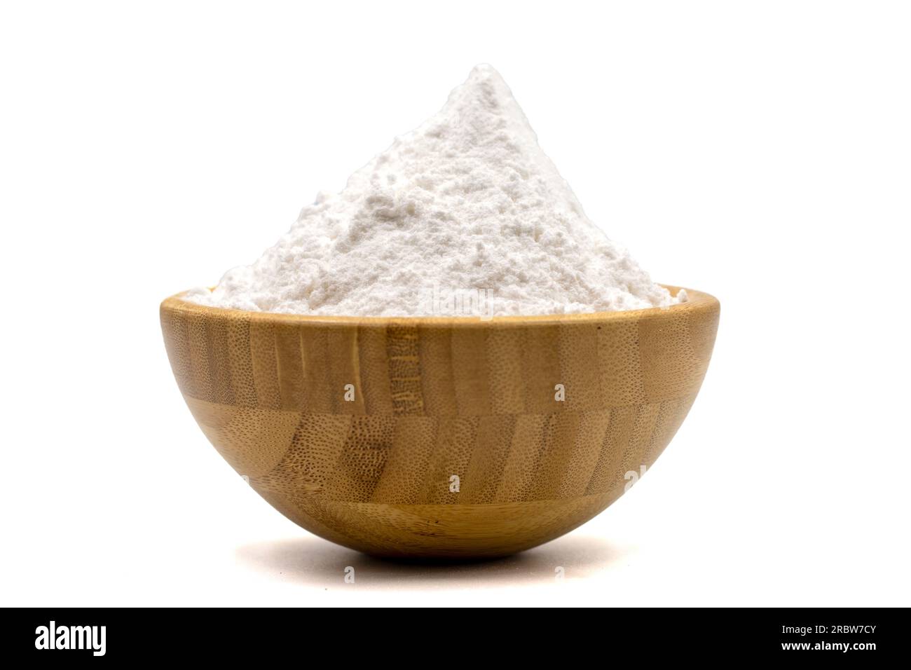 Wheat starch isolated on white background. Wheat starch in wooden bowl ...