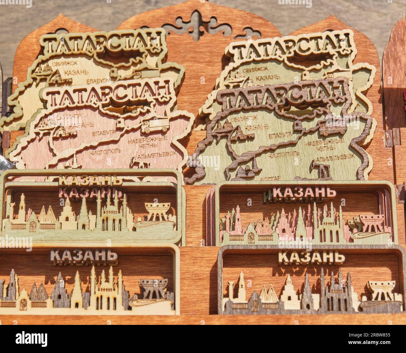 Souvenirs for tourists. Carved silhouettes of symbolic Kazan buildings ...