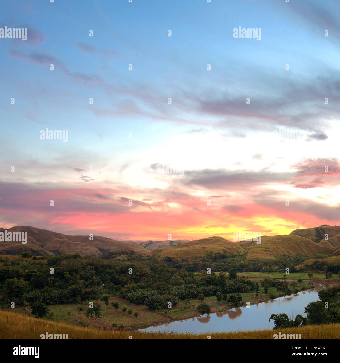Green hills with landscape view with a sunset sky background. Nature ...