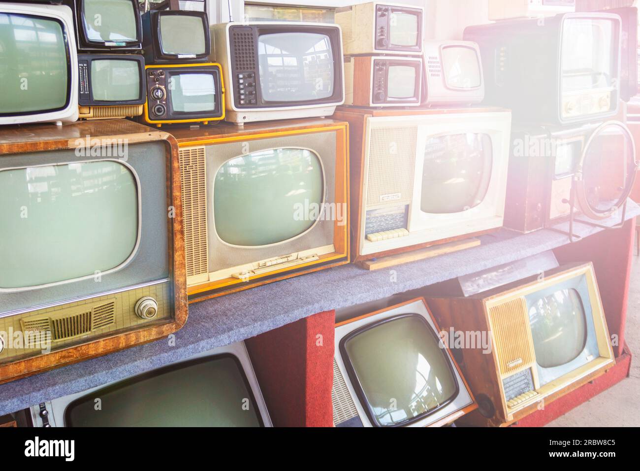 Many retro television. vintage old TV is colorful multi-row. Seeing the ...