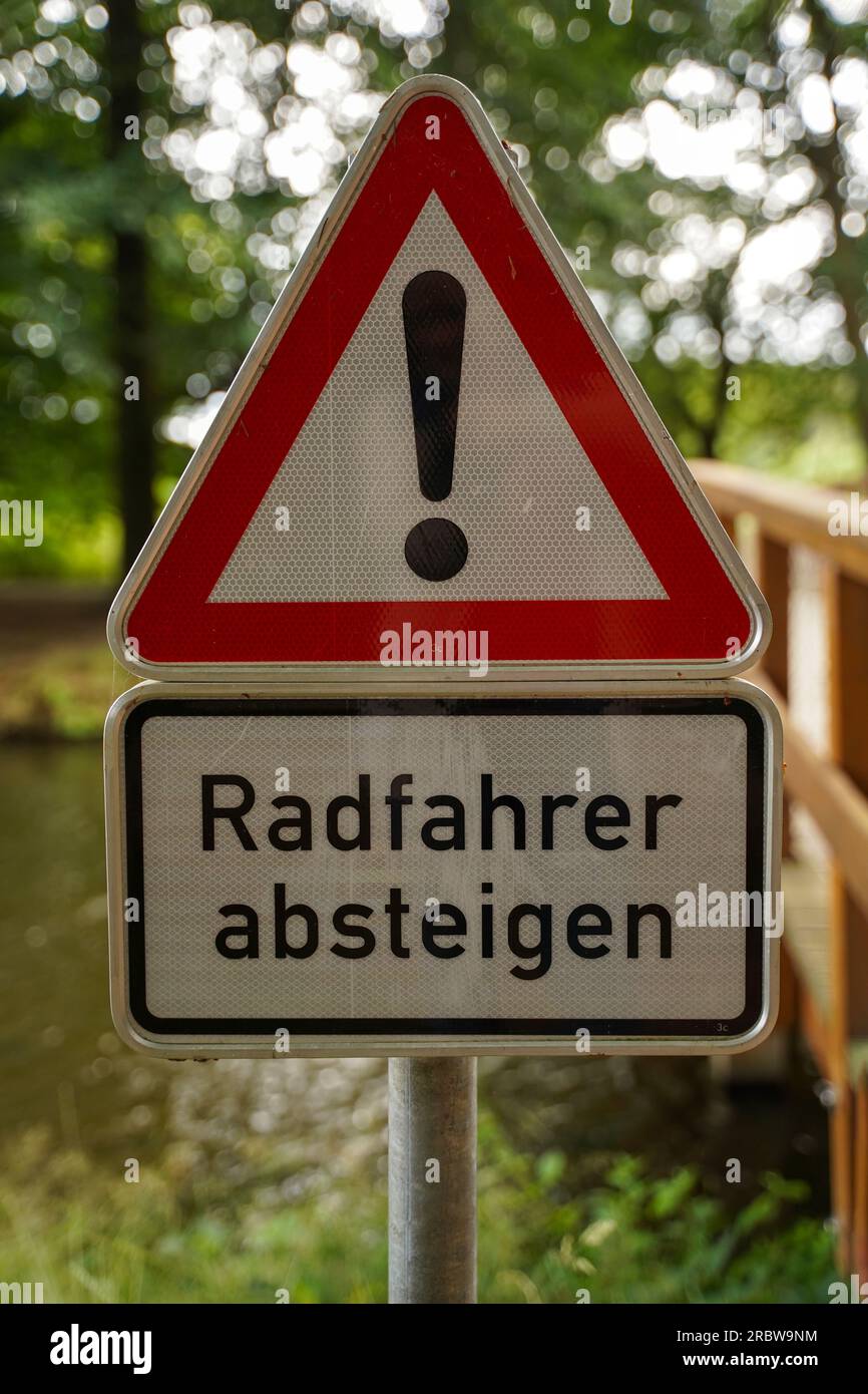 German road sign Walk your bike Stock Photo - Alamy