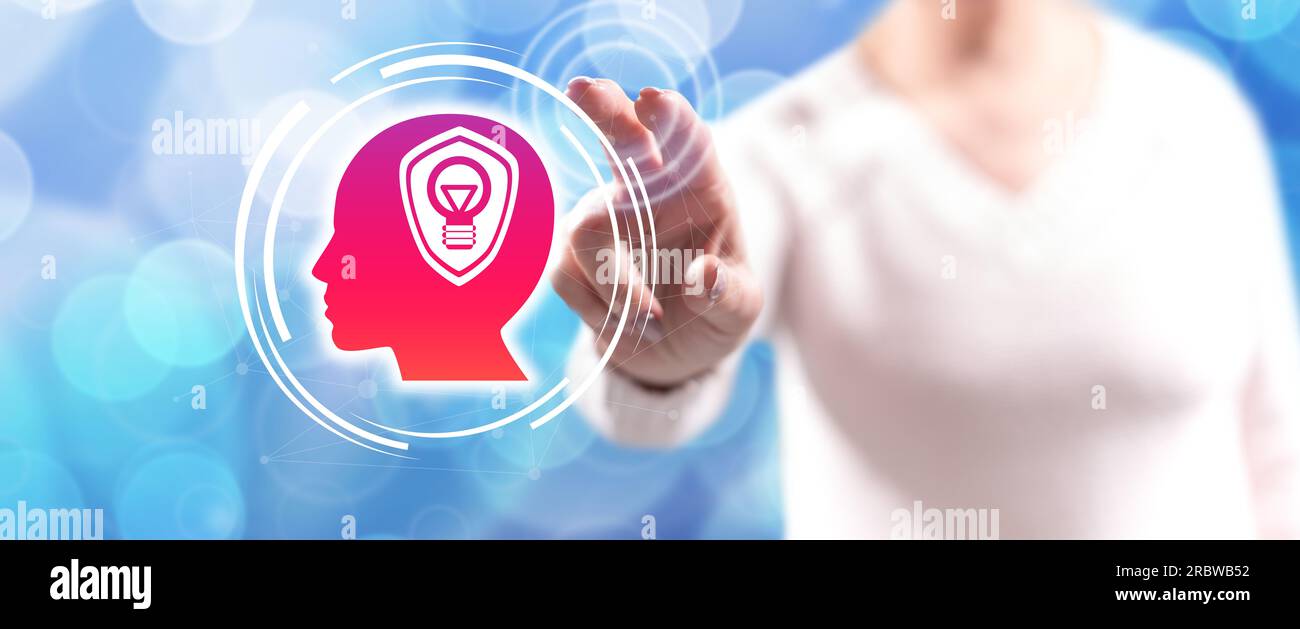 Woman touching an intellectual property concept on a touch screen with ...