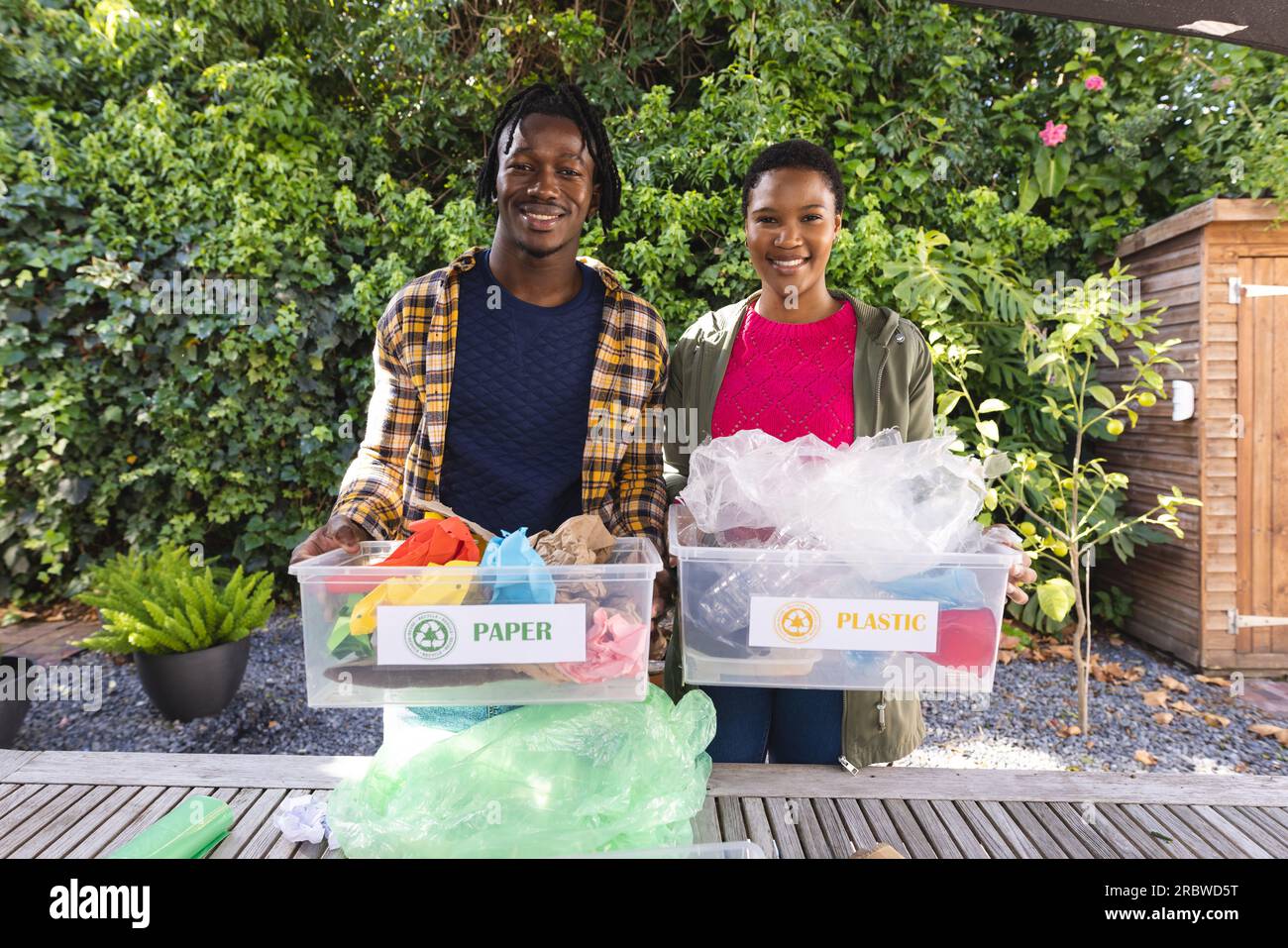 Happy african american couple recycling hi-res stock photography and ...