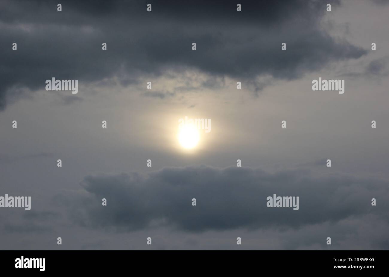 Sun with dramatic cloudscape Stock Photo - Alamy