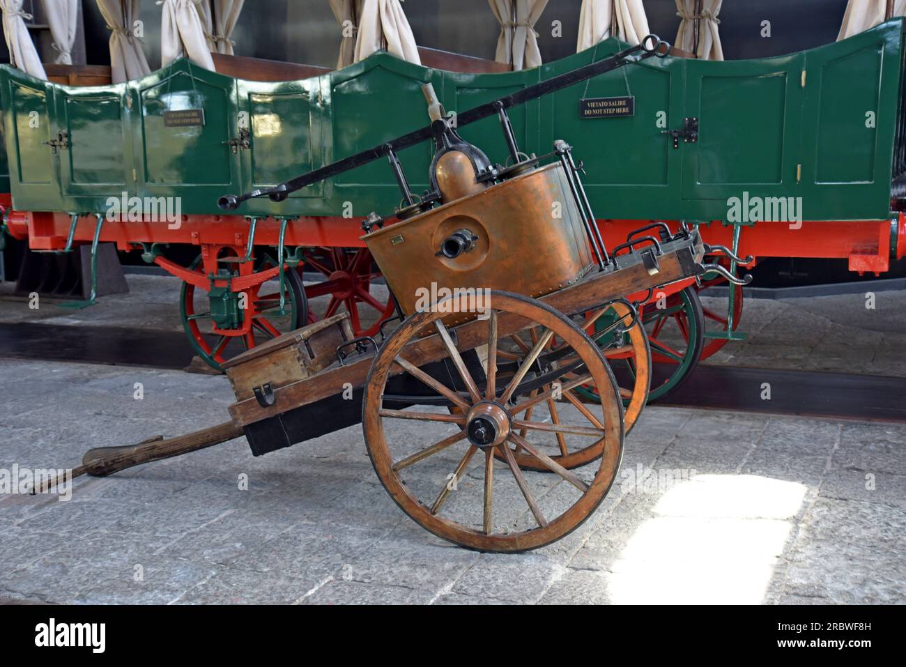 An antique horse drawn and hand powered fire fighting pump at the ...