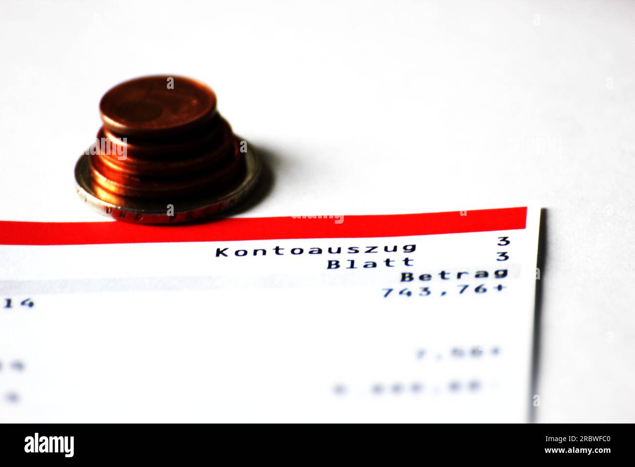 Abstract of account with some Euro coins Stock Photo - Alamy