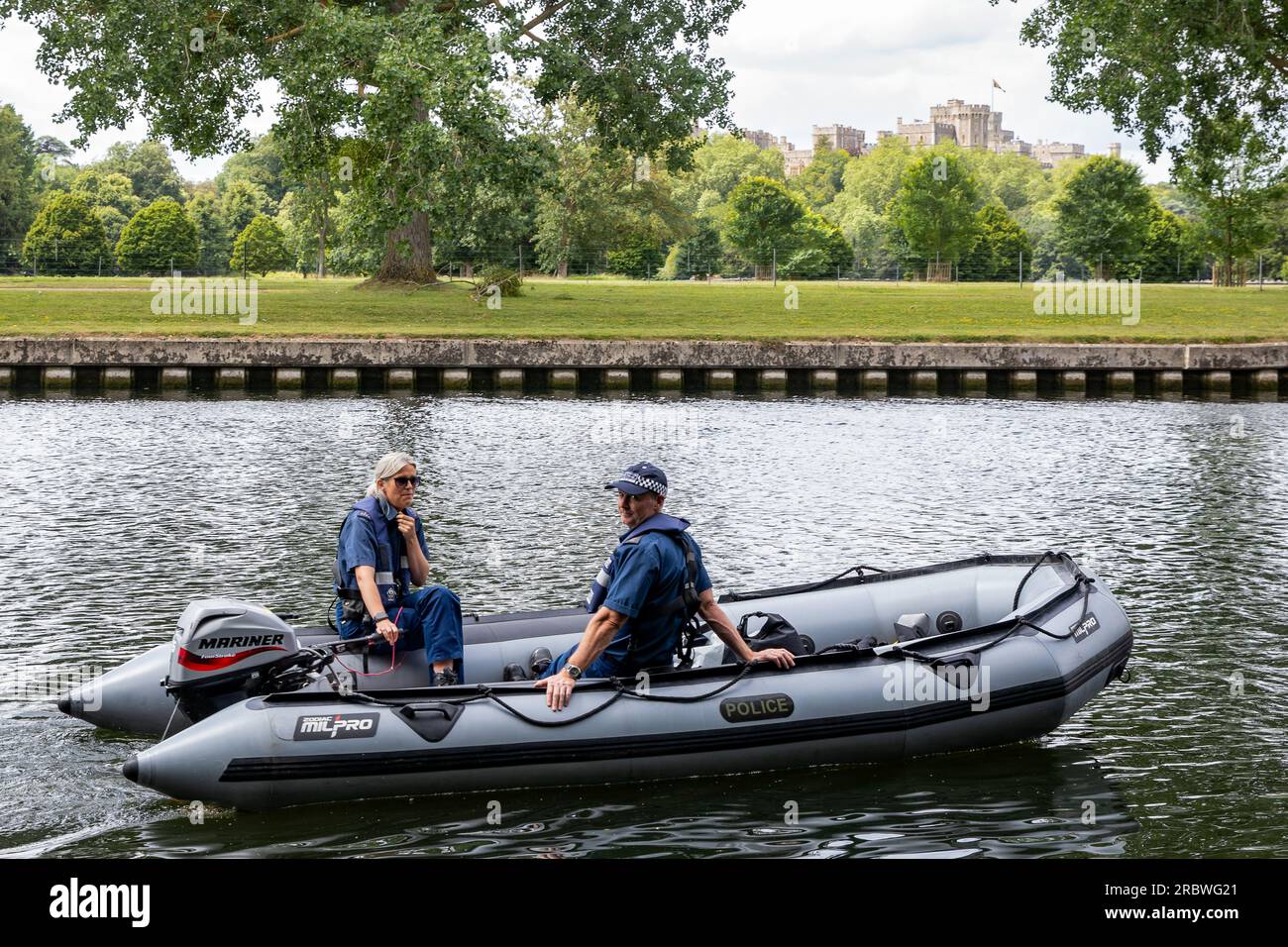 Windsor, UK. 10th July, 2023. Police officers use an inflatable boat to ...