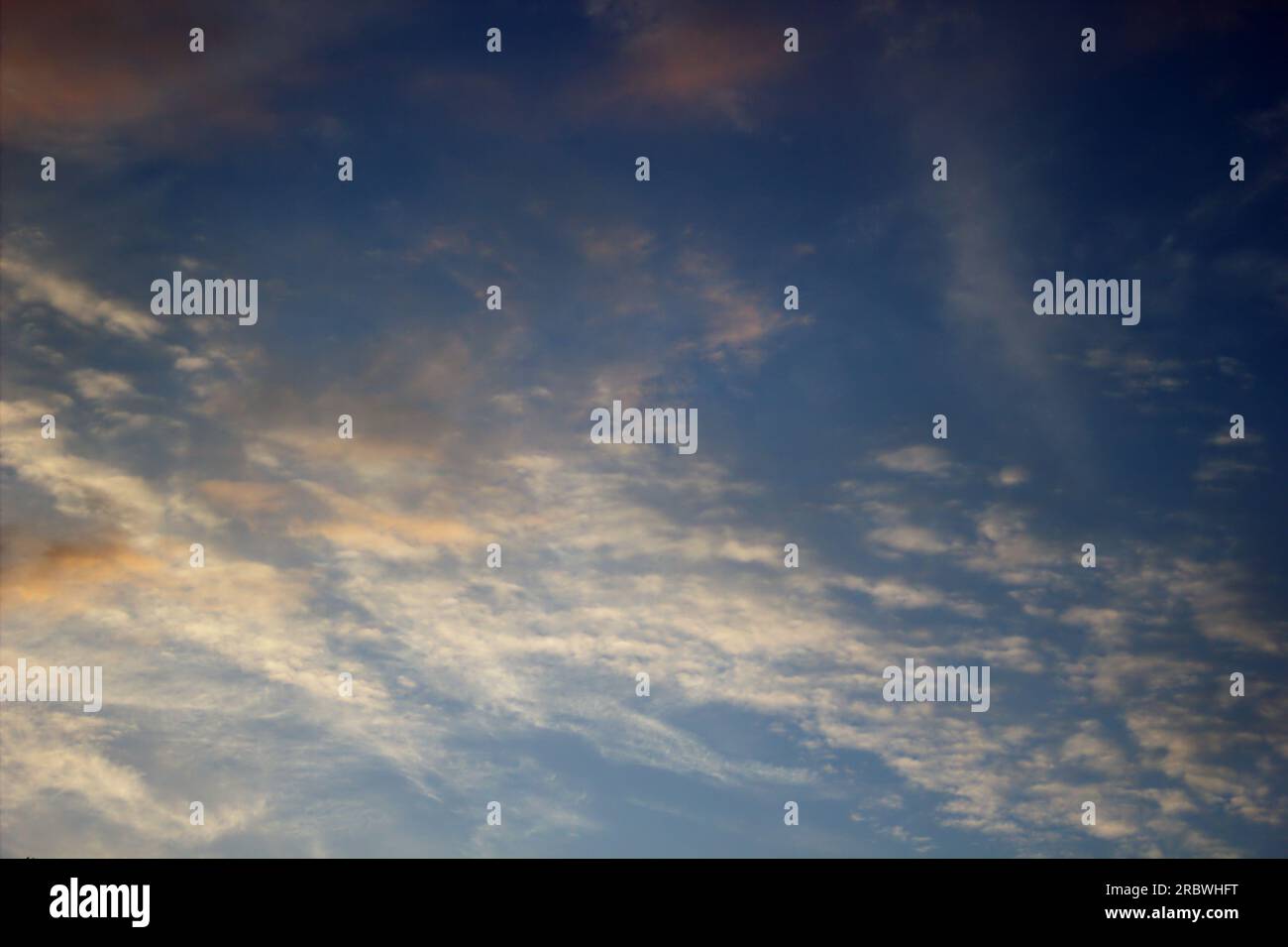 Different impressive and colorful clouds in the morning Stock Photo - Alamy