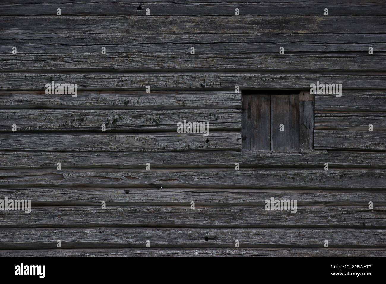 Dark wooden texture of log cabin with old window Stock Photo - Alamy