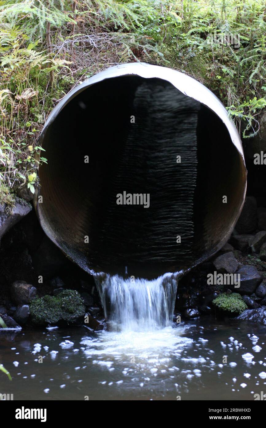 Water pipe in a stream Stock Photo - Alamy