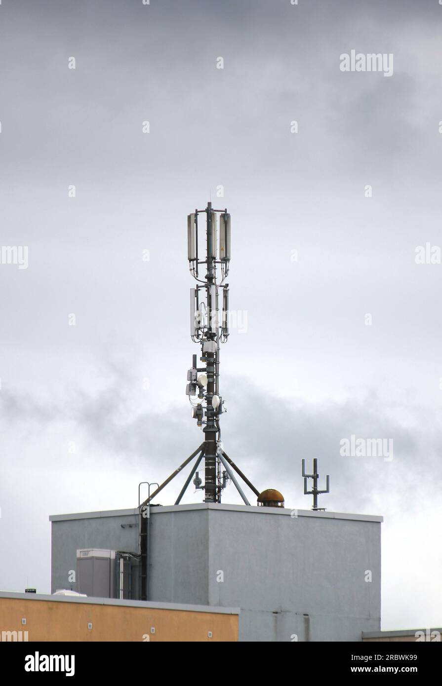 Telecommunications tower on a building Stock Photo - Alamy