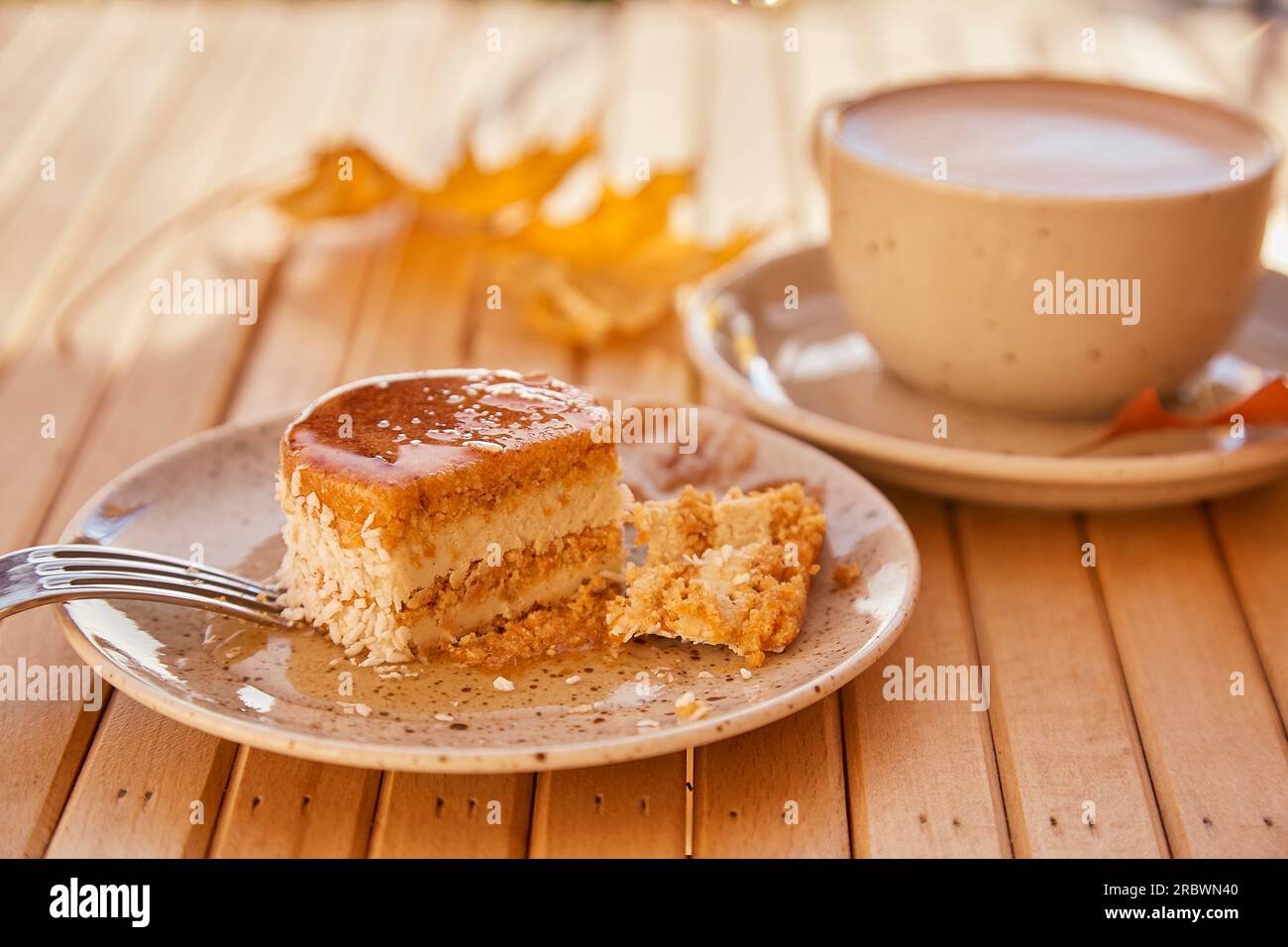 Autumn aesthetic vegan carrot dessert with agave syrup with cup of ...