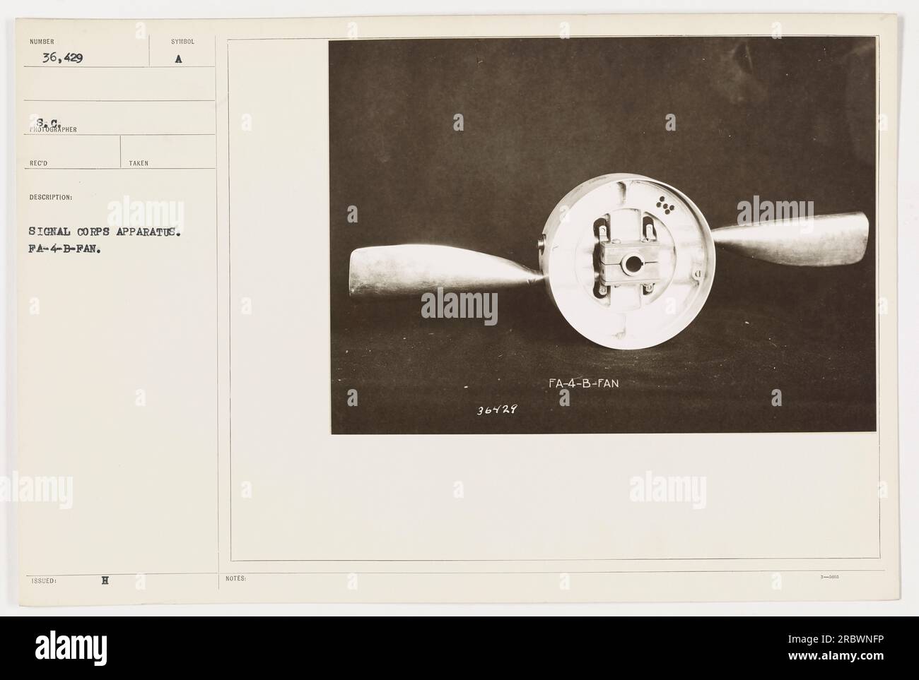 American soldiers inspecting a Signal Corps apparatus during World War ...