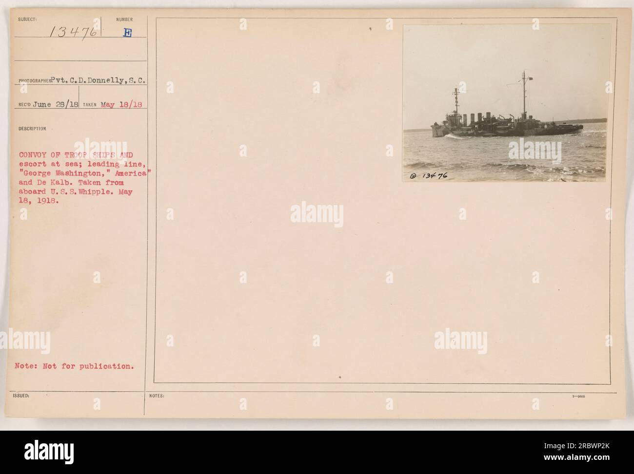 Caption: "USS Whipple (DD-217) escorting a convoy of troop ships at sea ...