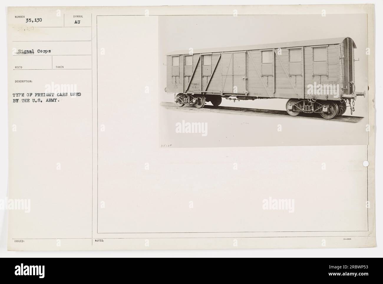 This photograph shows a group of U.S. Army soldiers standing beside a ...
