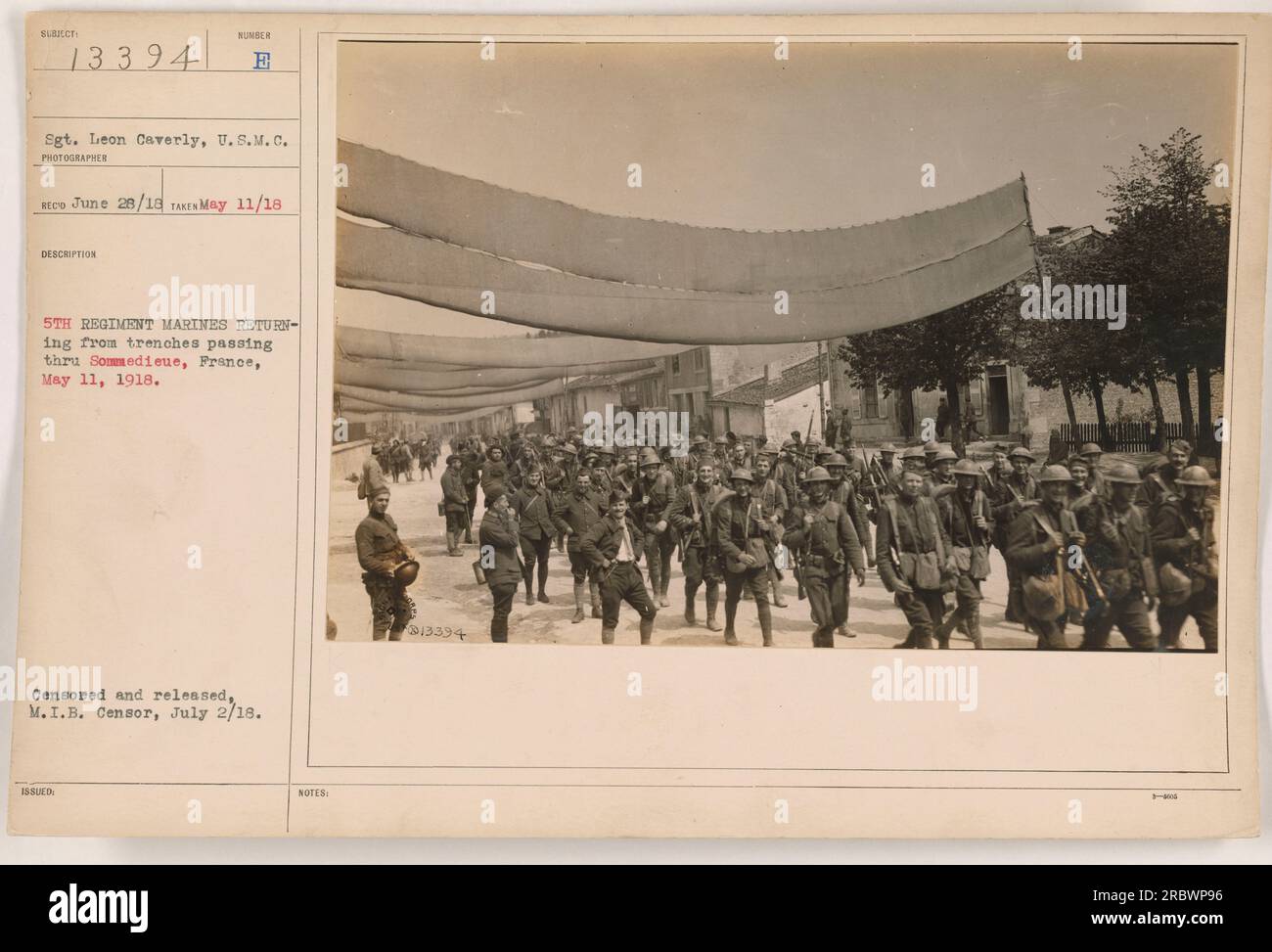 Sgt. Leon Caverly, a U.S.M.C. member, is photographed returning from ...