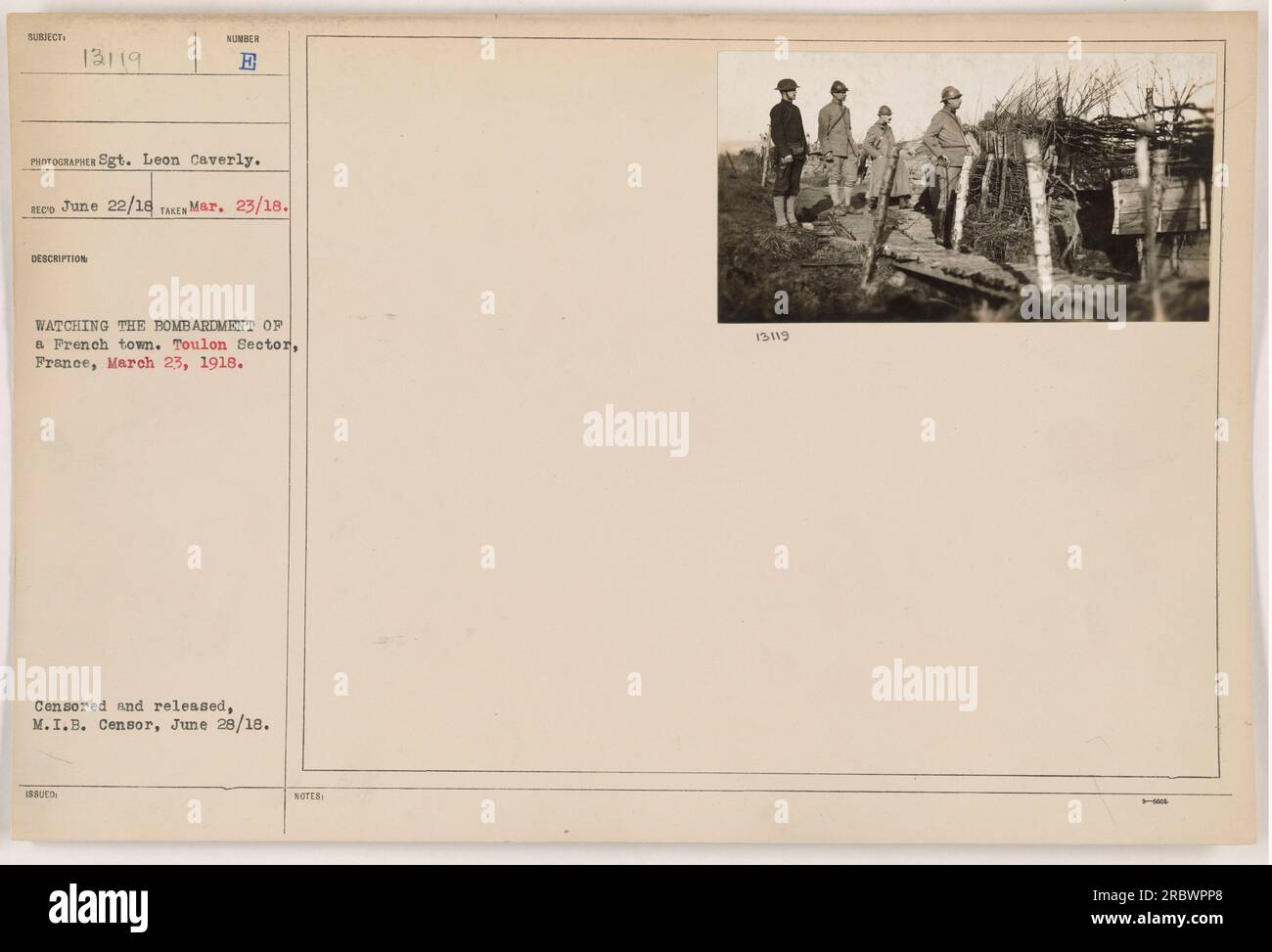 American soldiers observing the bombardment of a French town in the ...