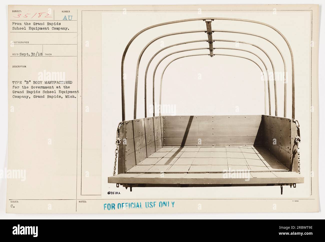 A soldier from the Grand Rapids School Equipment Company poses with a ...