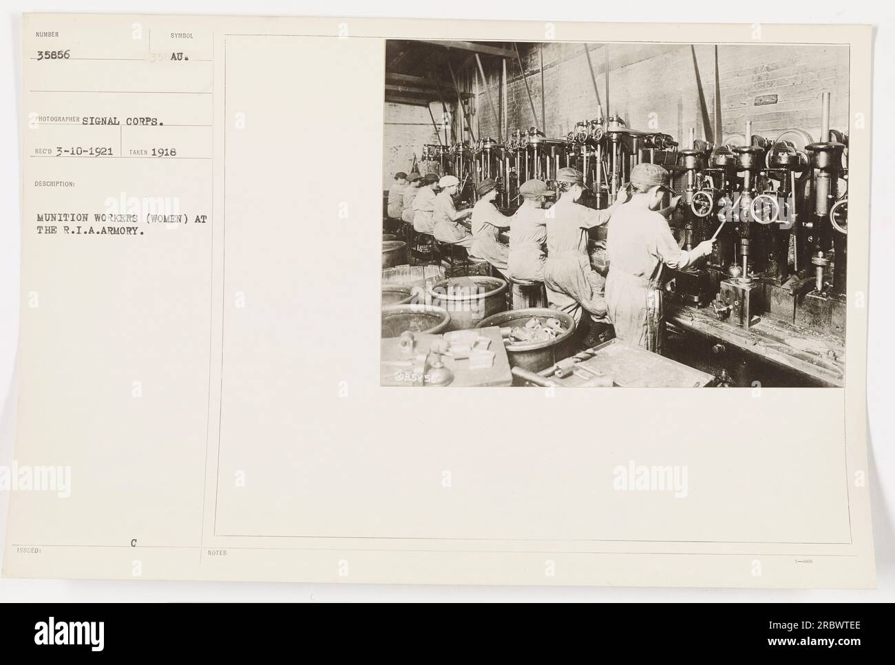 Munition workers (women) at the R.I.A. Armory in 1916. This photograph ...