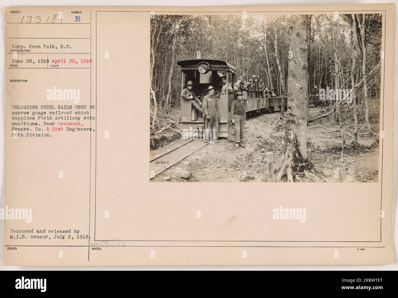 Corporal Keen Polk of the 21st Engineers, 26th Division, unloading ...