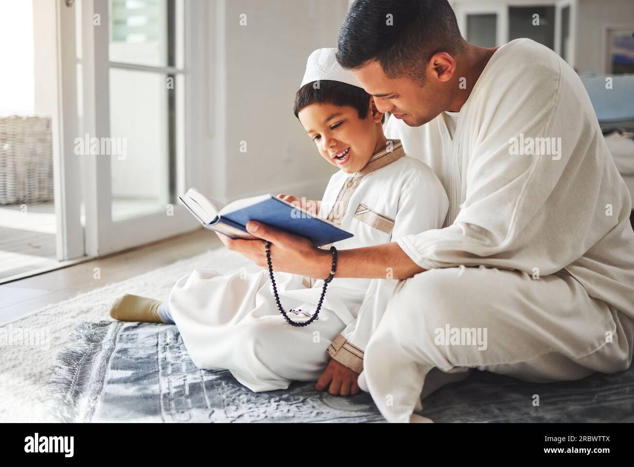 Quran, Muslim and father and happy kid praying to Allah, god or holy ...