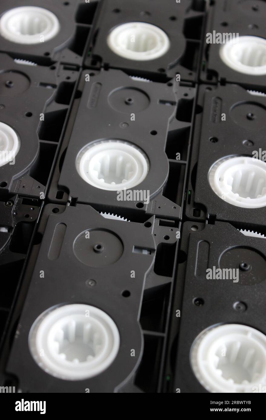 Attached close to each other rare small video cassettes textured ...