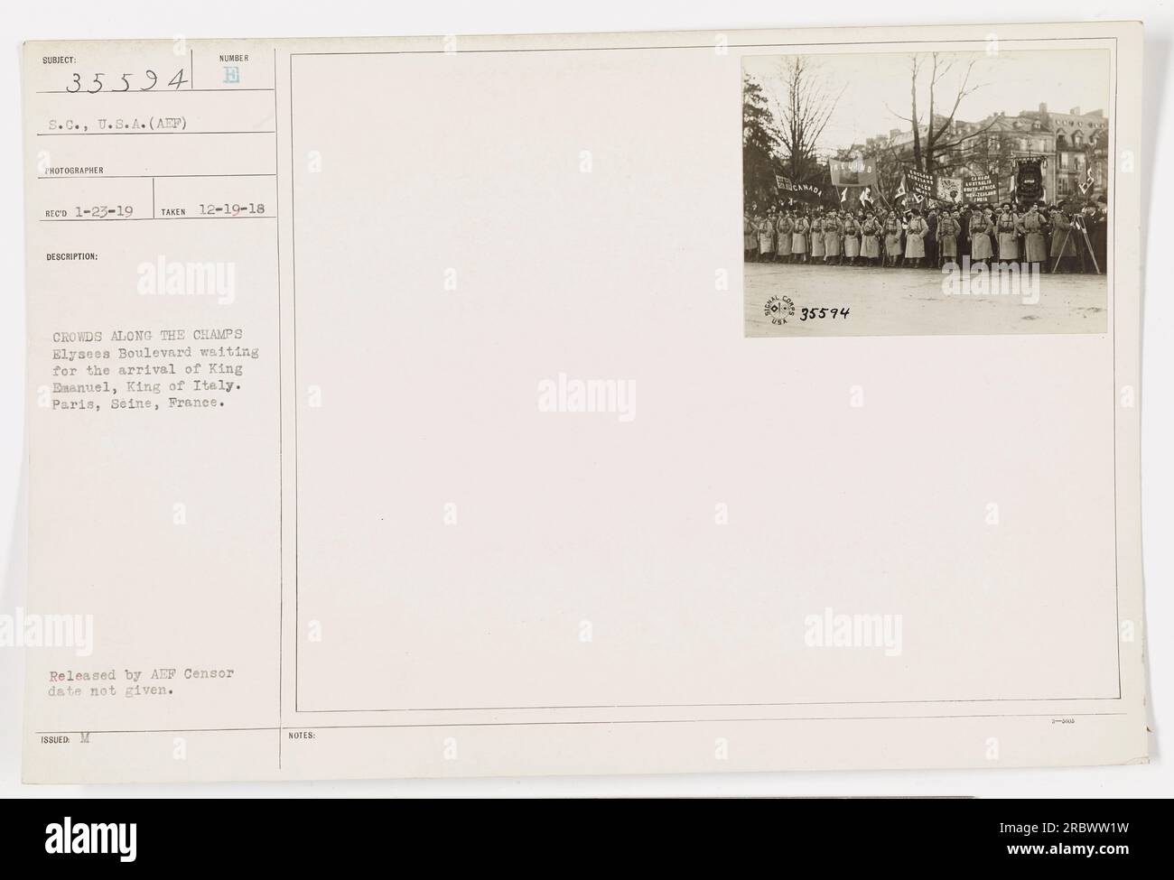 Crowds line the Champs Elysees Boulevard in Paris, France, awaiting the ...