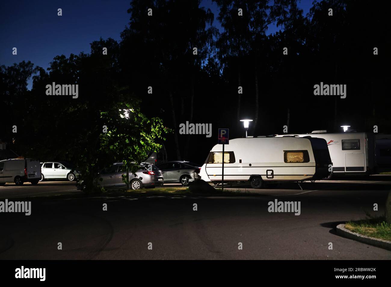 Cars, caravans and RV:s, Brahehus rest area, Sweden Stock Photo - Alamy