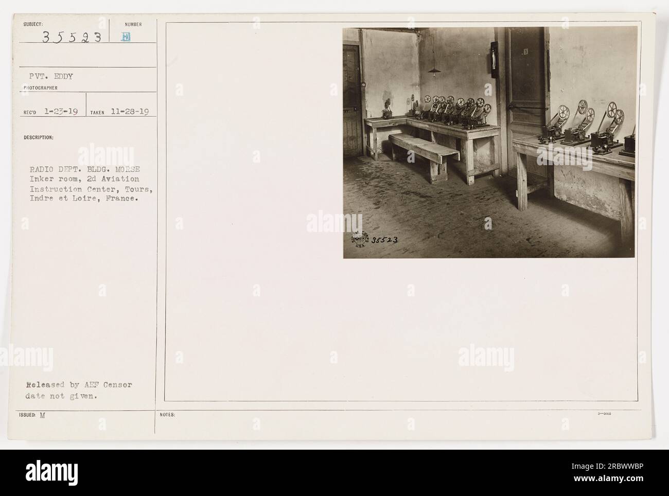 Private Eddy stands inside the Suuri Radio Dept. Building in the Morse ...