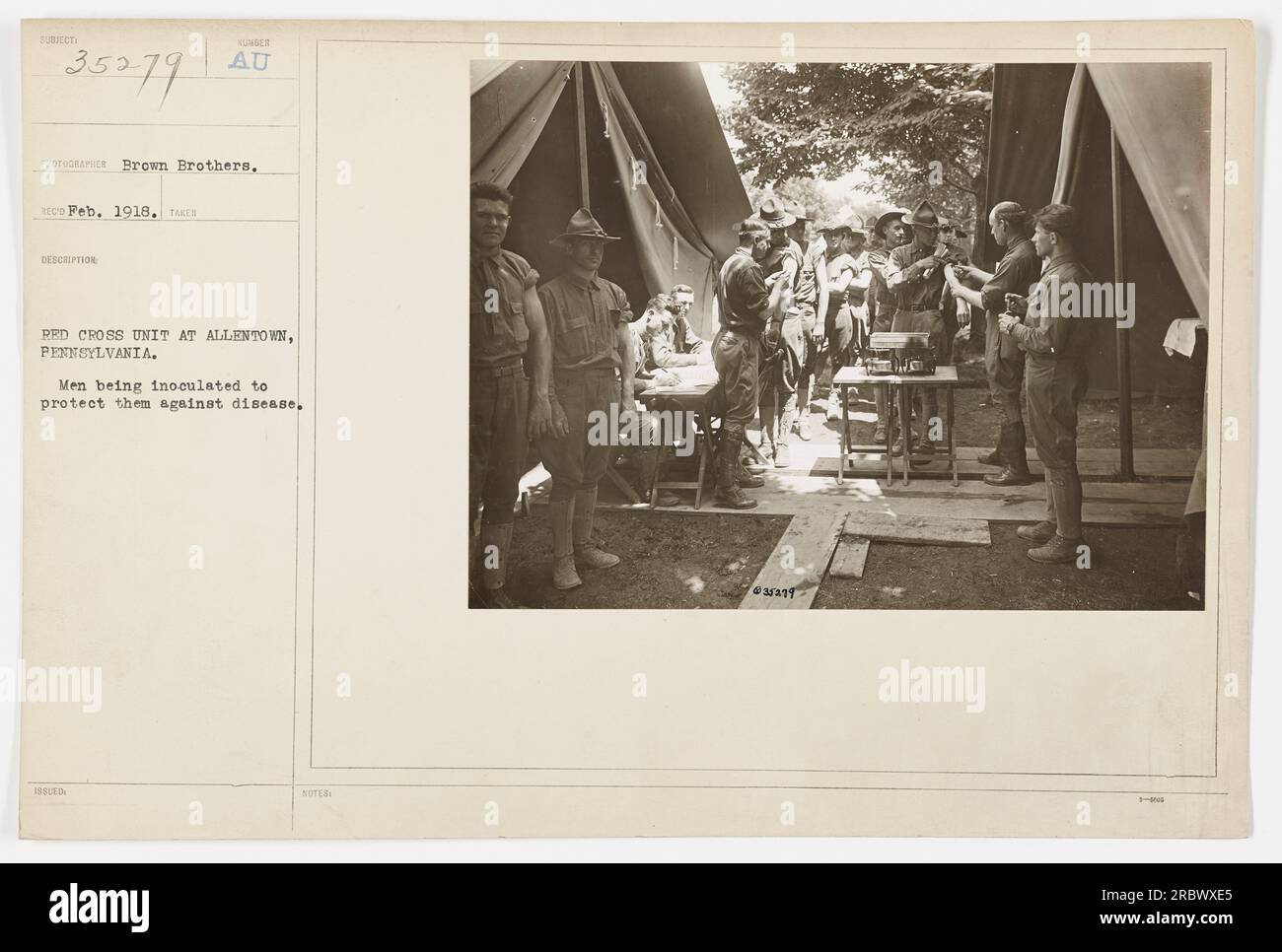 American soldiers receiving inoculations for disease prevention at a ...