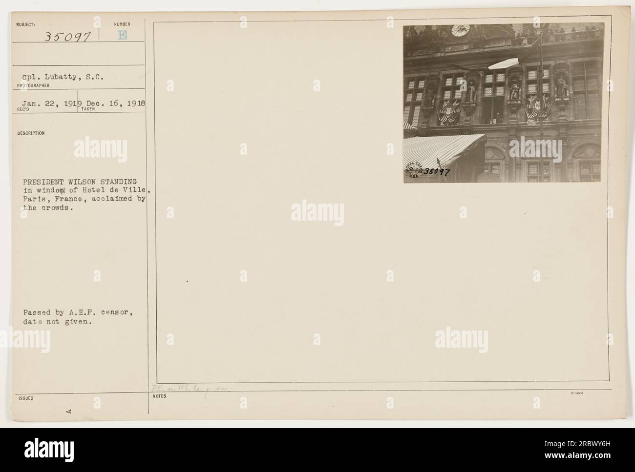 President Wilson standing in the window of Hotel de Ville, Paris ...