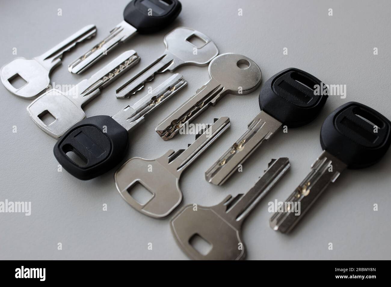 Different Steel Lock Keys Laid Out On White Surface Angle View Stock ...