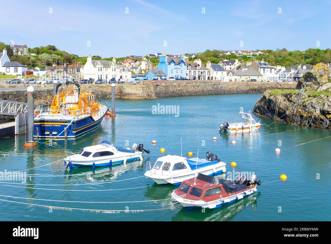 Portpatrick harbour with fishing boats and lifeboat Portpatrick village ...