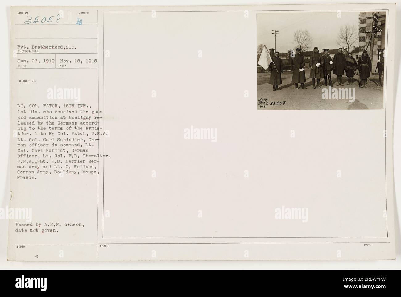 Lt. Col. Patch, 18th Inf., 1st Div., receives guns and ammunition from ...